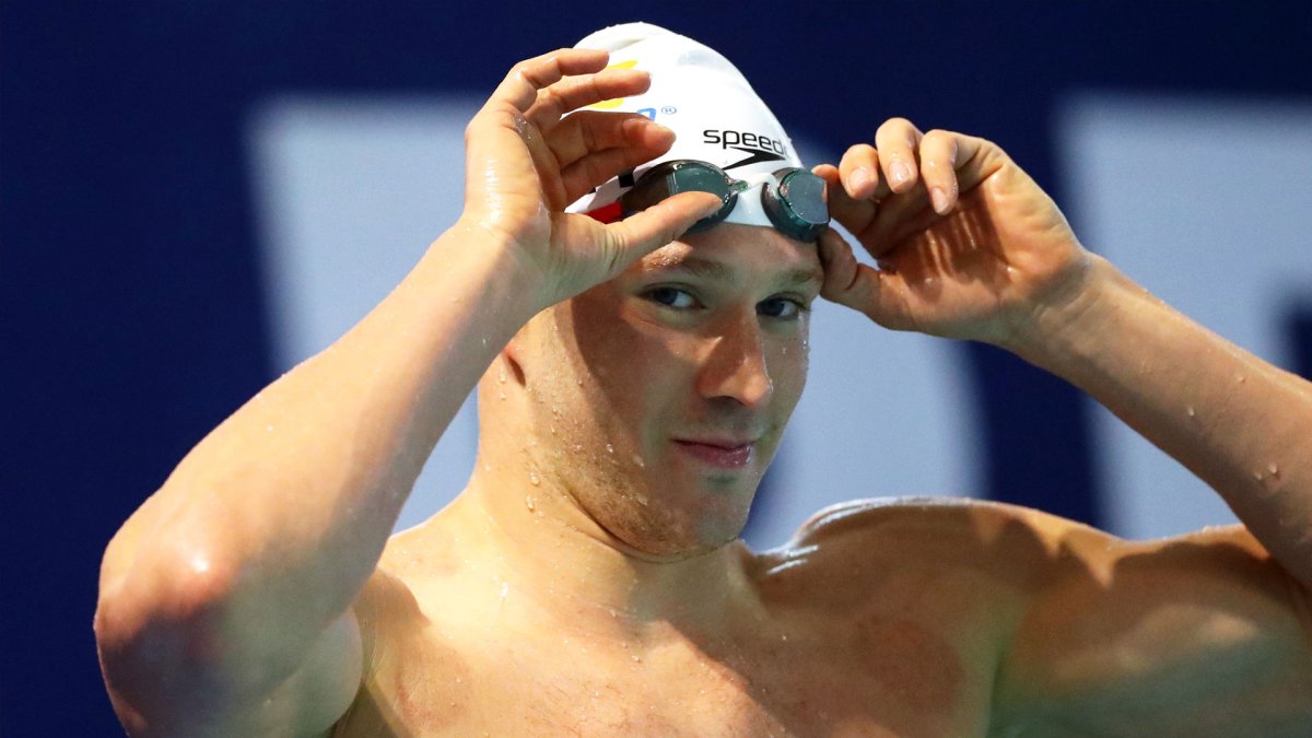 Cal grad Ryan Murphy pushes car as part of Olympic swimming training ...